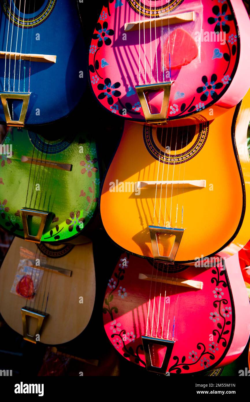 Colourful acoustic guitars at a street market, Los Angeles, USA Stock ...