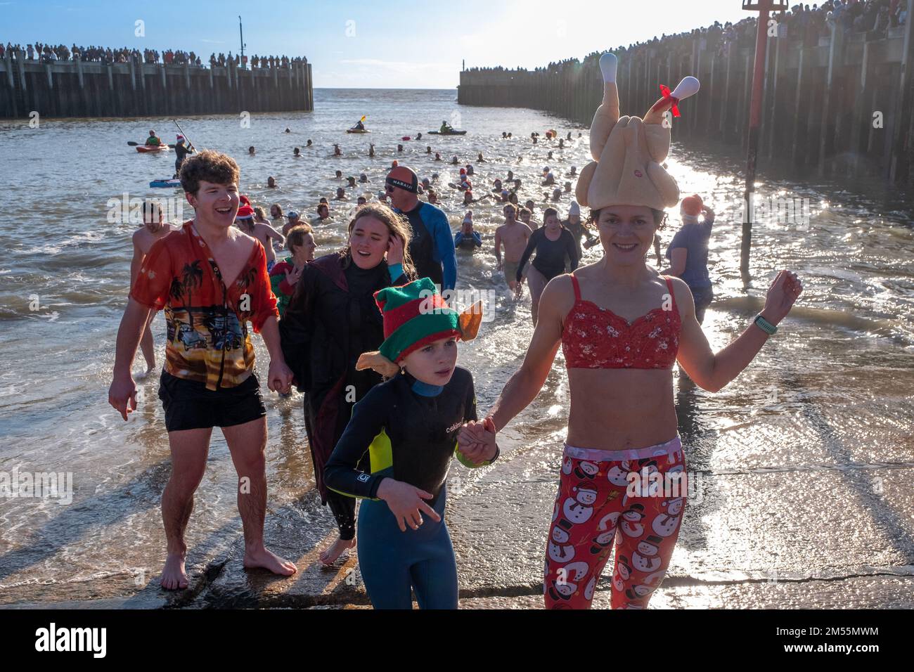 West Bay, Dorset, UK. 26th Dec, 2022. Hundreds of Boxing Day swimmers ...