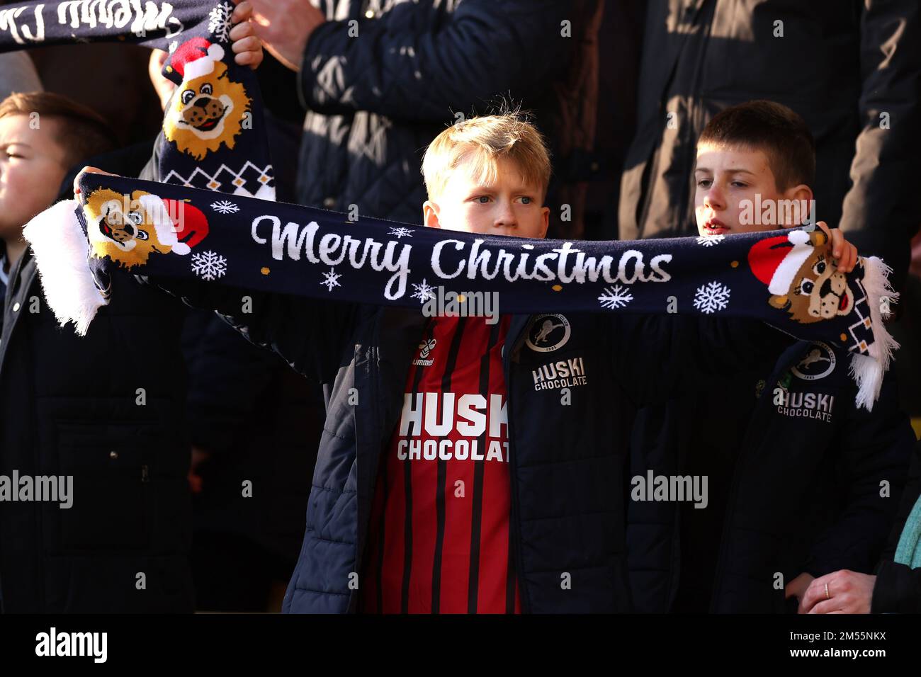 Millwall fans hold up scarves saying 'Merry Christmas' during the Sky ...