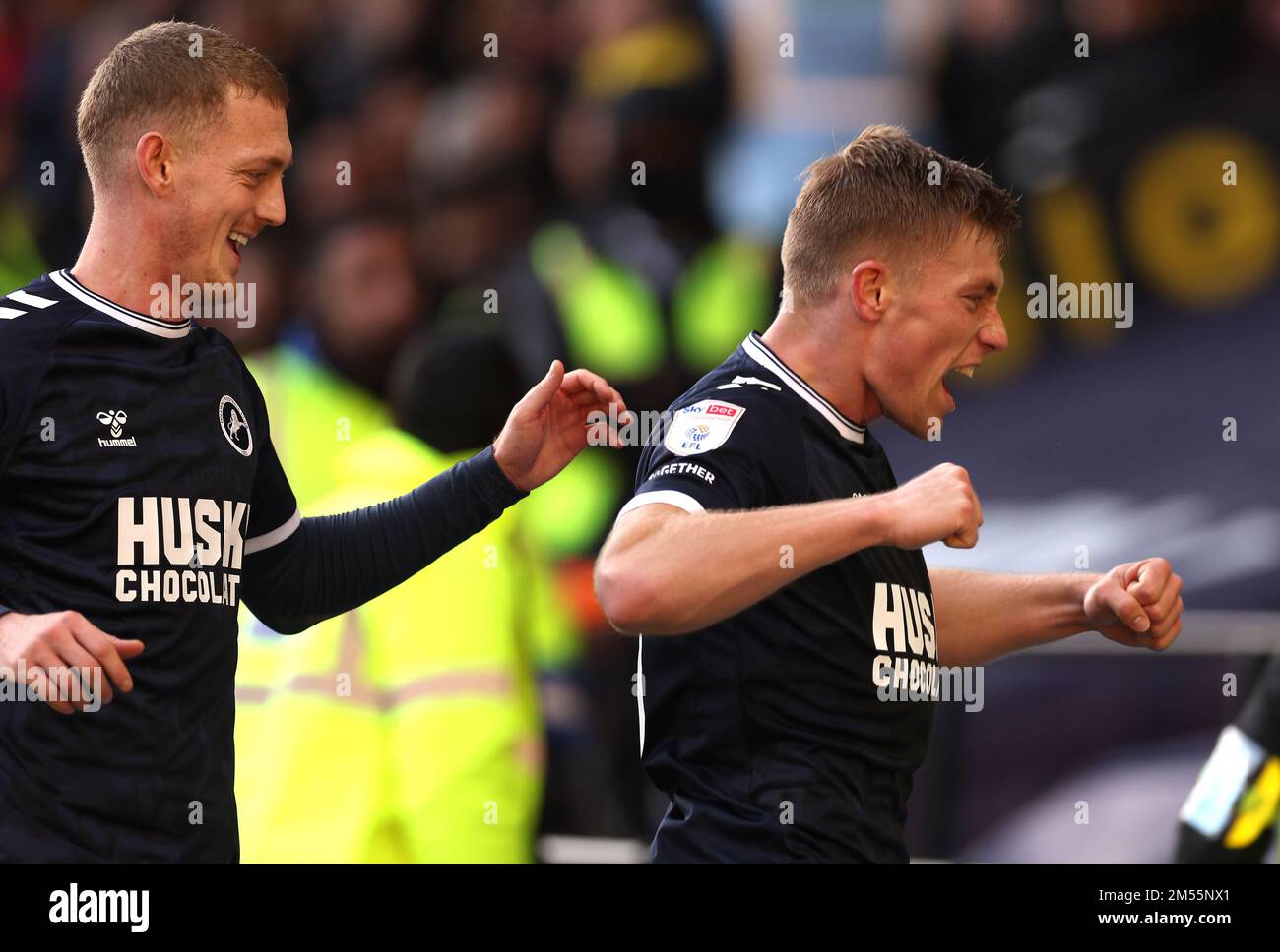 Millwall's Zian Flemming (right) celebrates scoring their side's second ...
