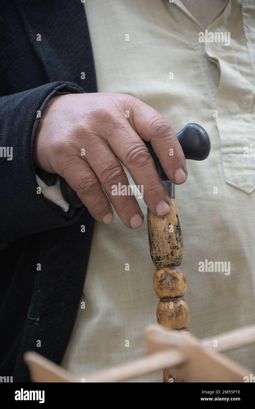 Old man holding a stick hi-res stock photography and images - Alamy