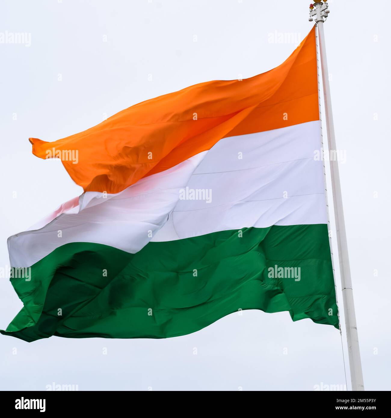 India flag flying high at Connaught Place with pride in blue sky, India ...