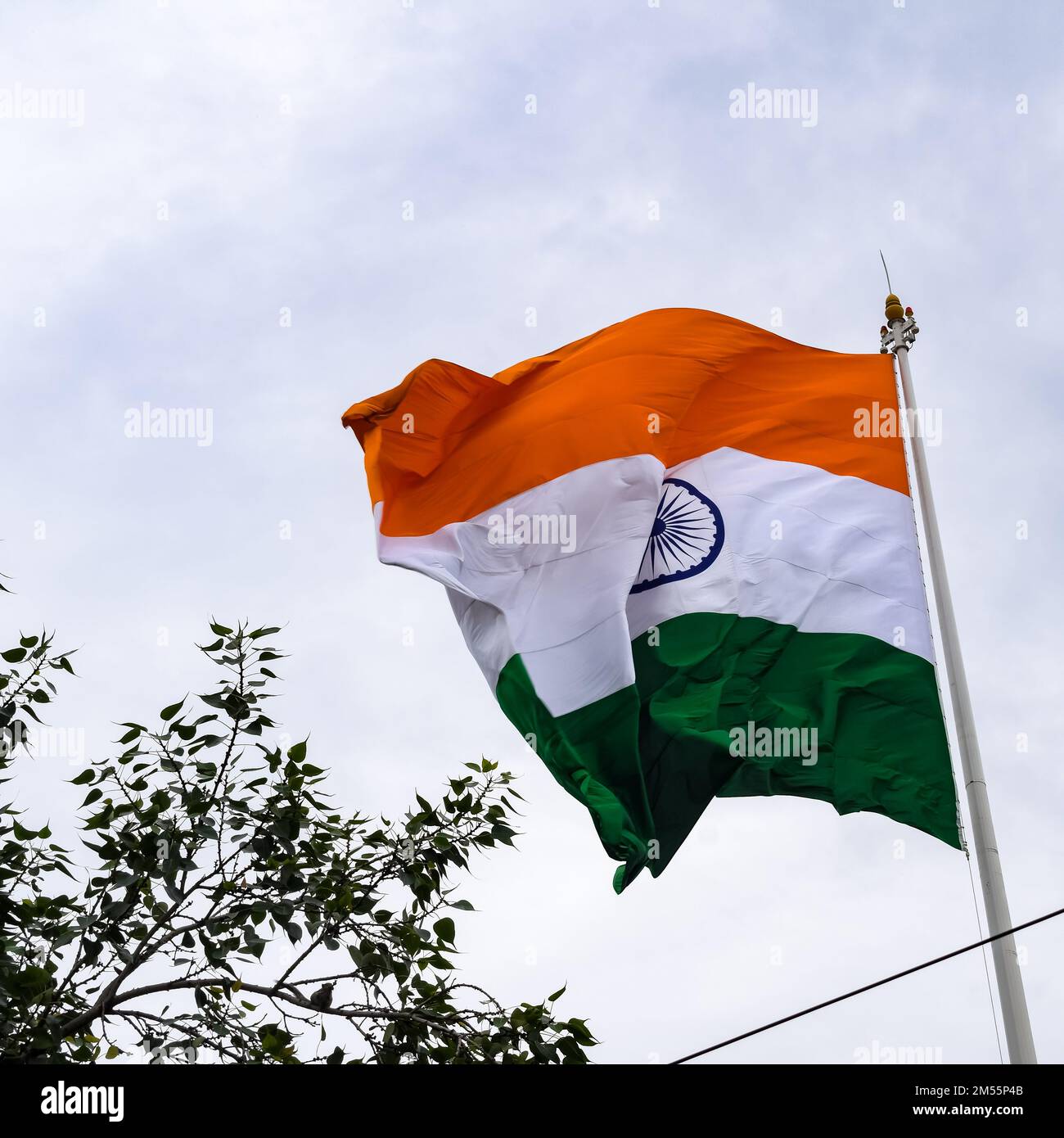 India flag flying high at Connaught Place with pride in blue sky, India ...