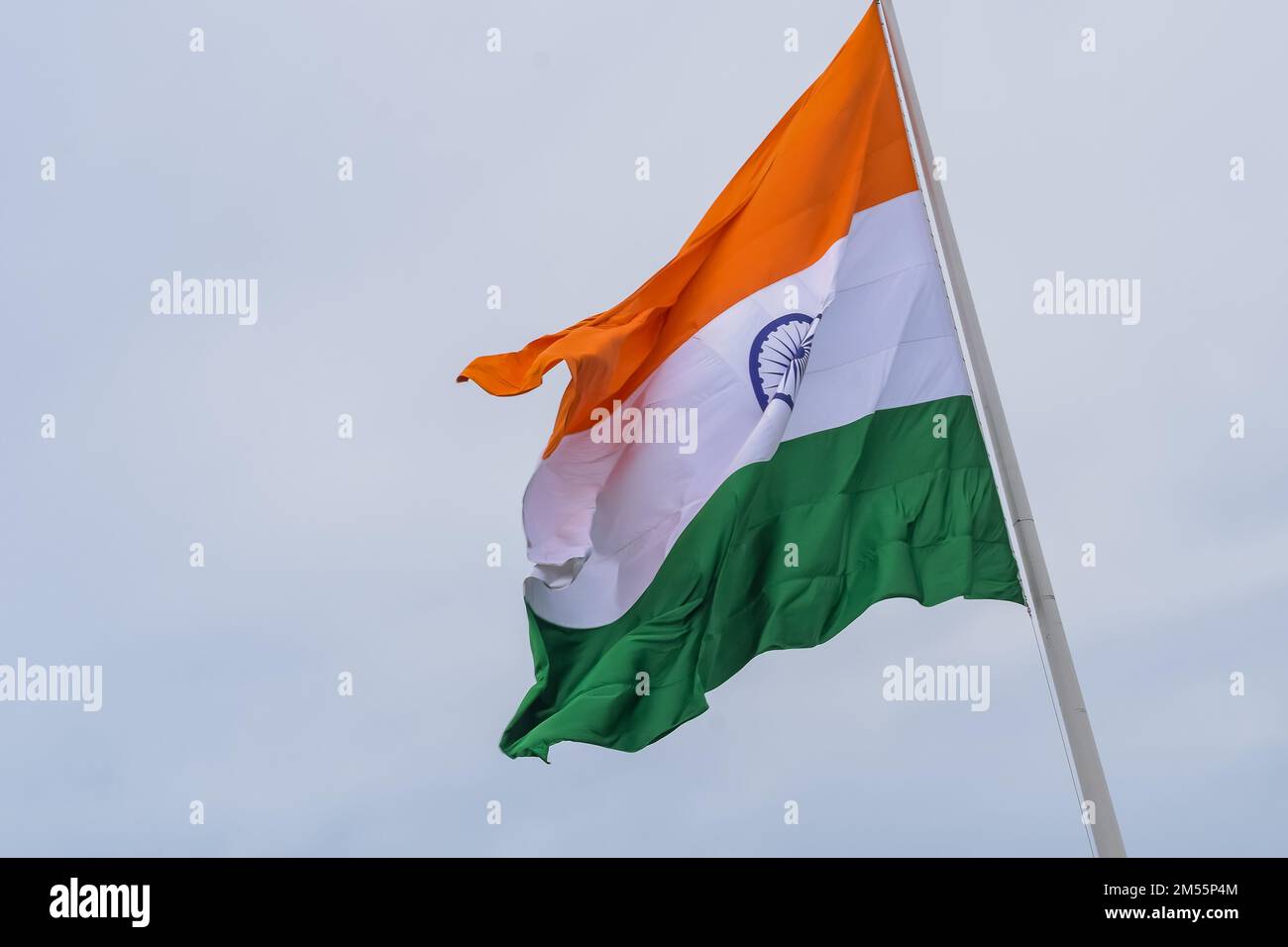 India flag flying high at Connaught Place with pride in blue sky, India ...