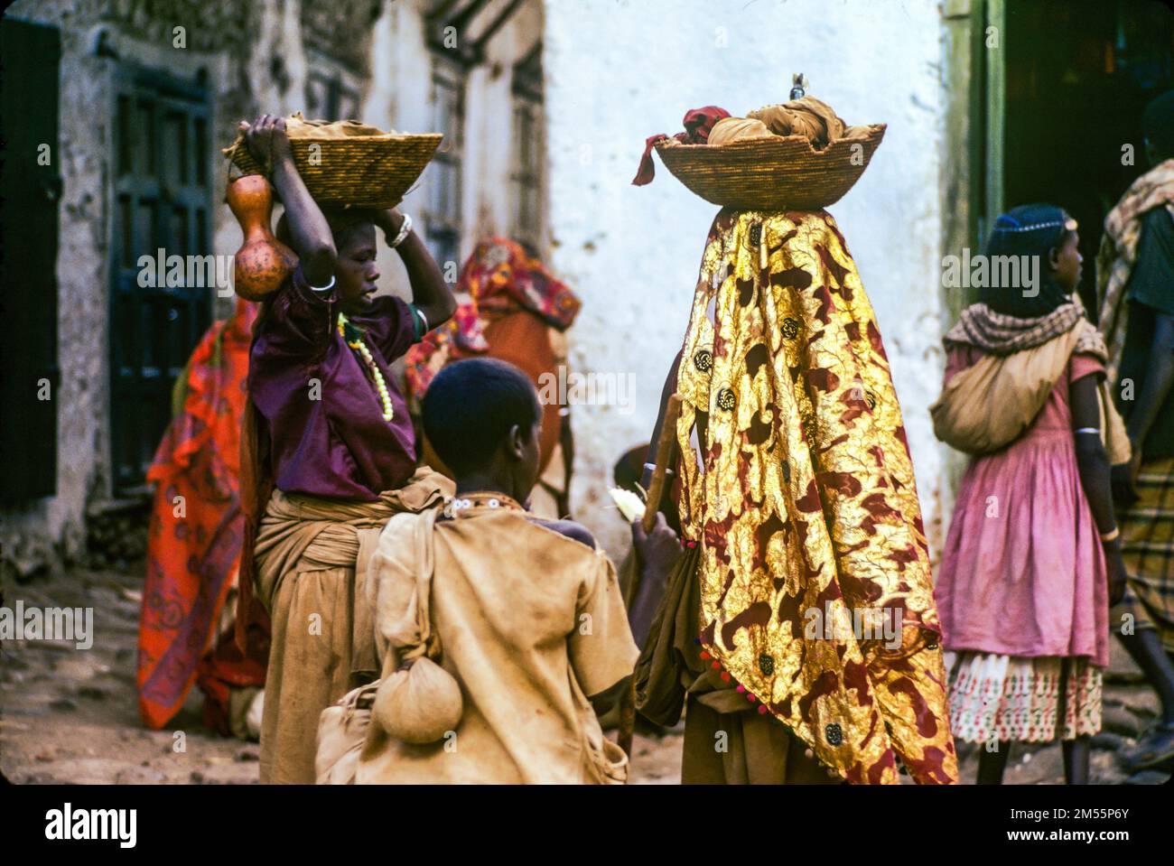 Ethiopia, 1970s, Harar, shopping street, women carrying baskets on ...