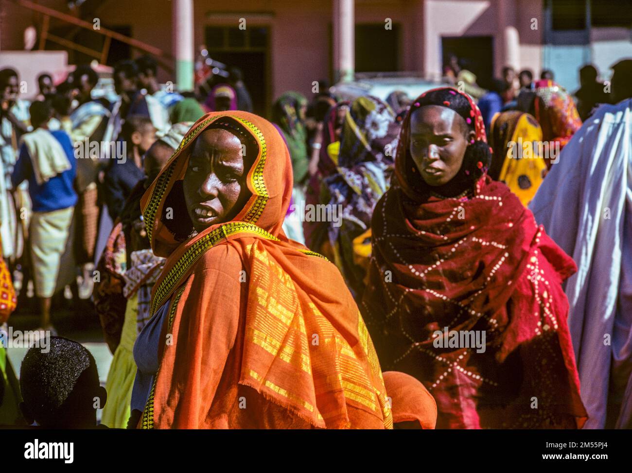 Ethiopia, 1970s, Harar, crowded market, women with colourful dresses ...