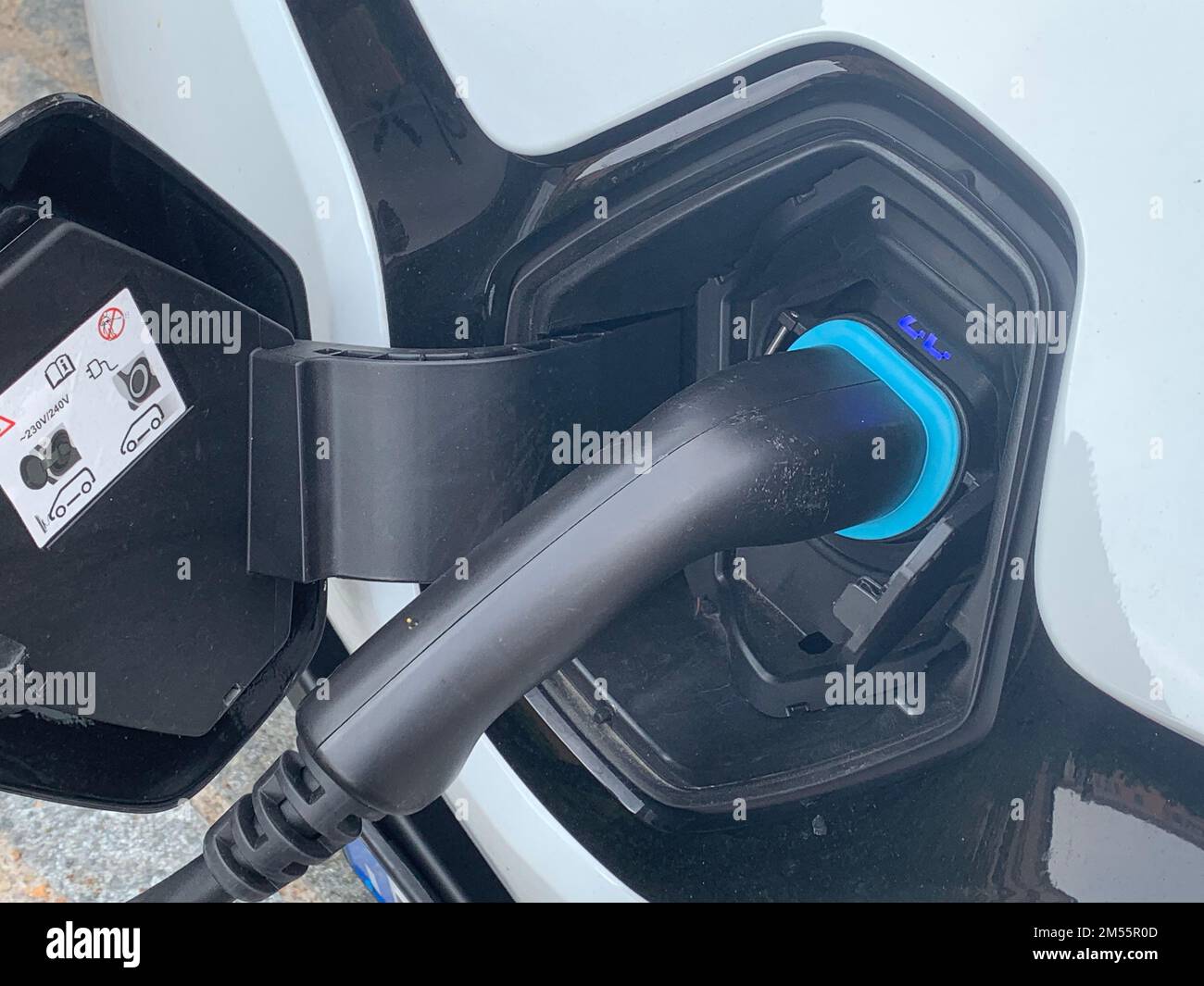 Electric car charge, EV Car or Electric vehicle at charging station ...