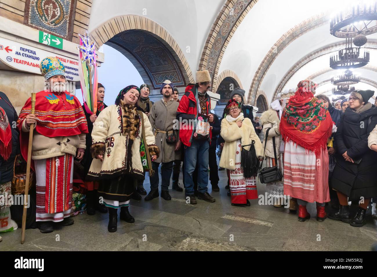 Residents in Ukrainian folklore costumes sing carols, and hold a ...