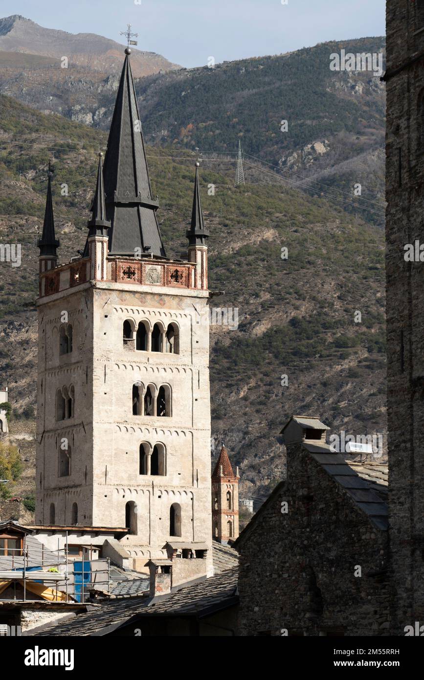 Town view with the tower in Susa in Piedmont, Italy, background blue ...