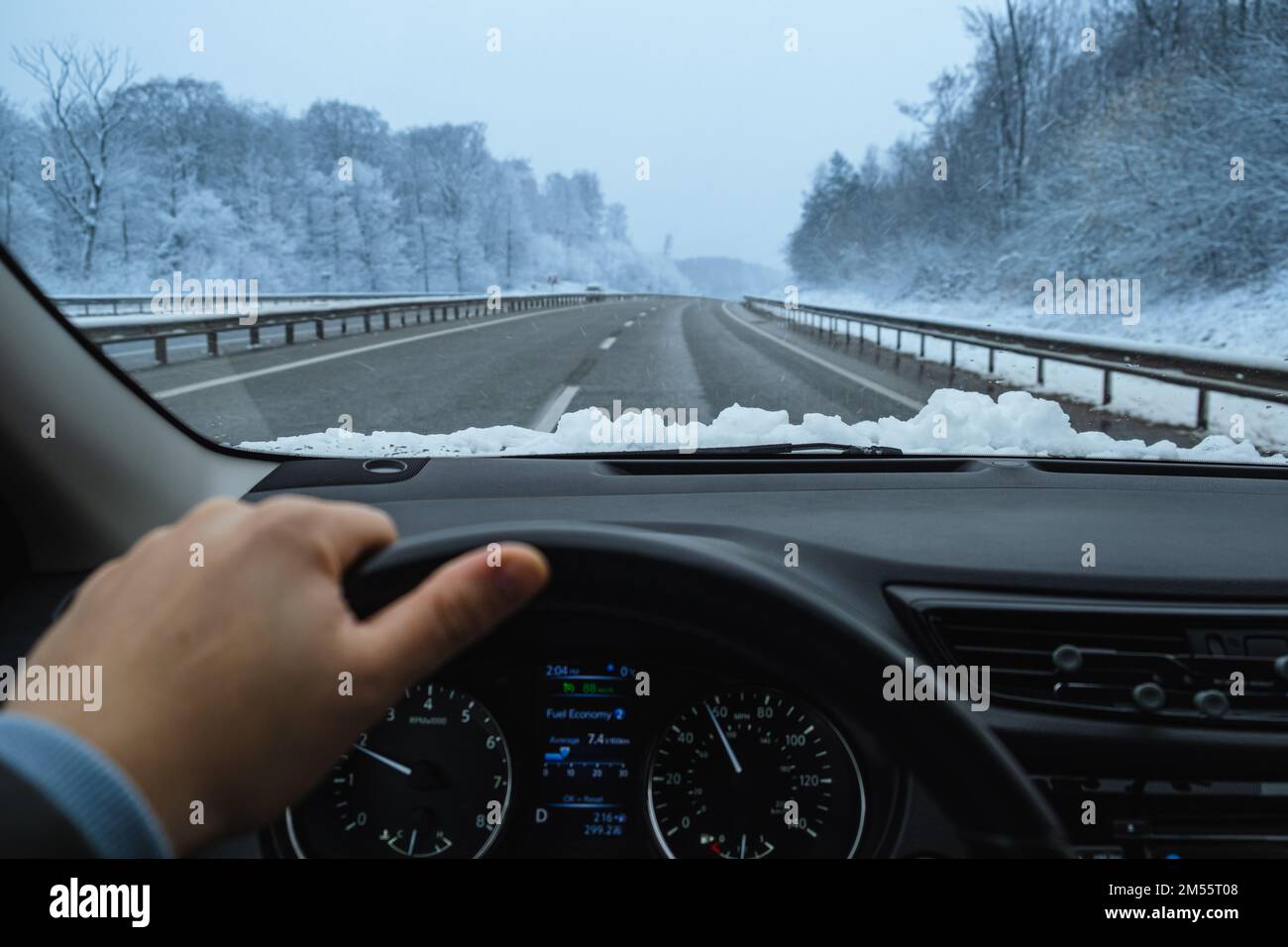 winter road view of the middle of the car from the first face Stock ...