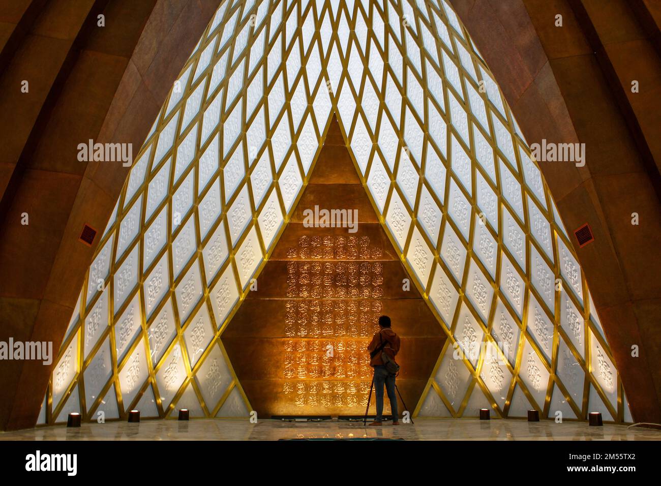 A journalist takes pictures inside of the Al-Jabbar Mosque during Media ...