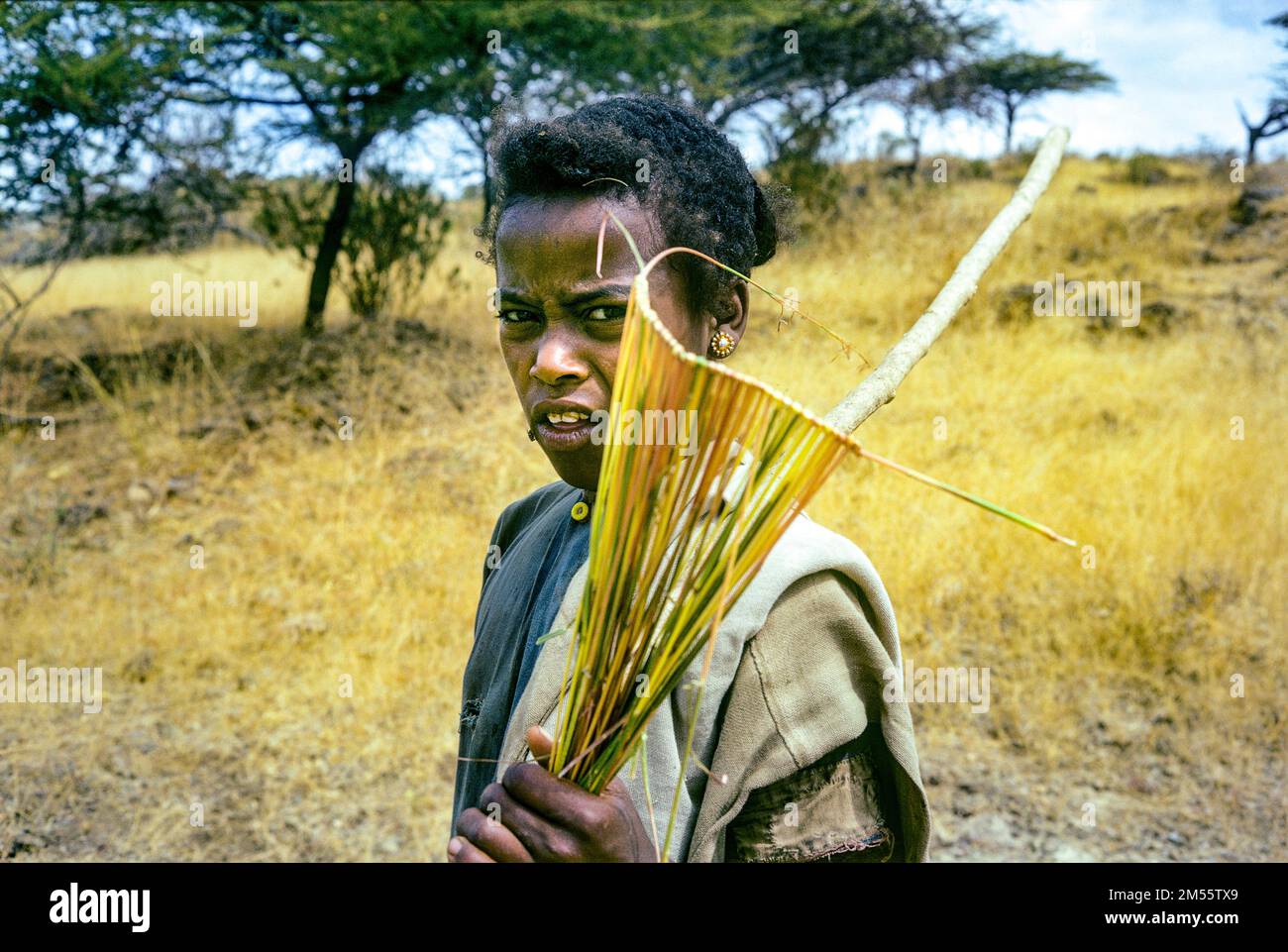 Ethiopia, 1970s, little girl with fly swatter portrait, Oromia region ...