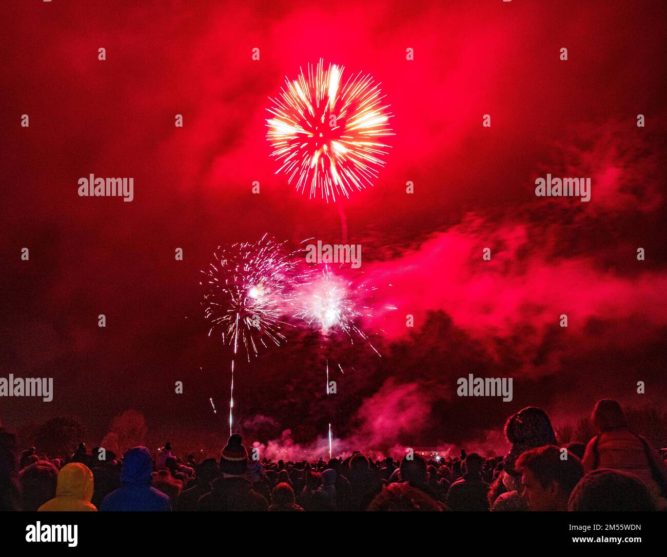 The crowd enjoying the Bicester Round Tables annual fireworks at night ...