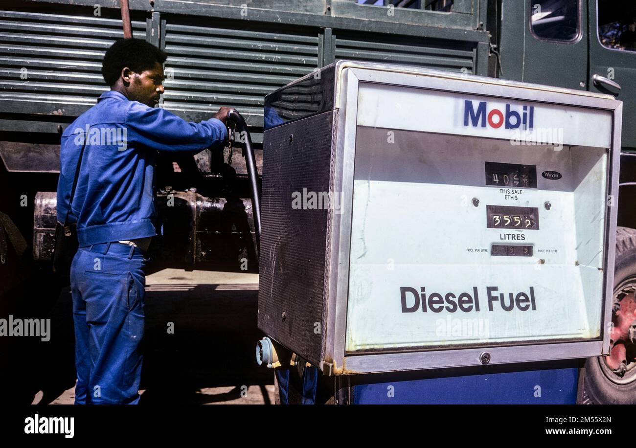 Ethiopia, 1970s, Dire Dawa, lorry driver refuelling with diesel fuel ...