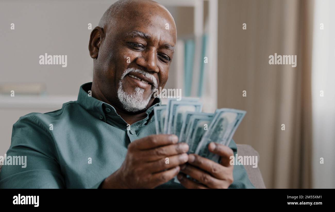 Happy african american satisfied winning bet elderly retired man ...