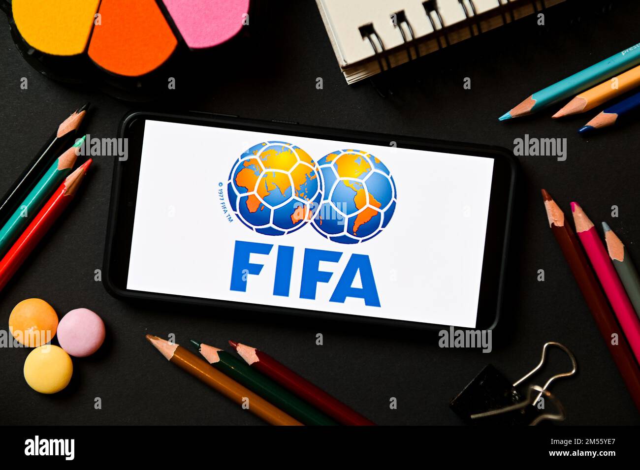 Poland. 17th Dec, 2022. In this photo illustration a FIFA logo seen ...