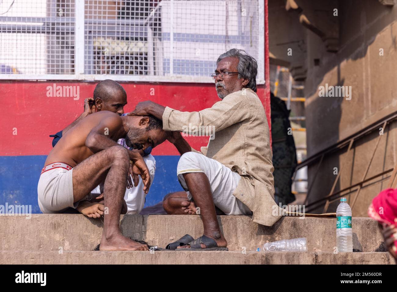 Varanasi, Uttar Pradesh, India - November 2022: Street barber ...
