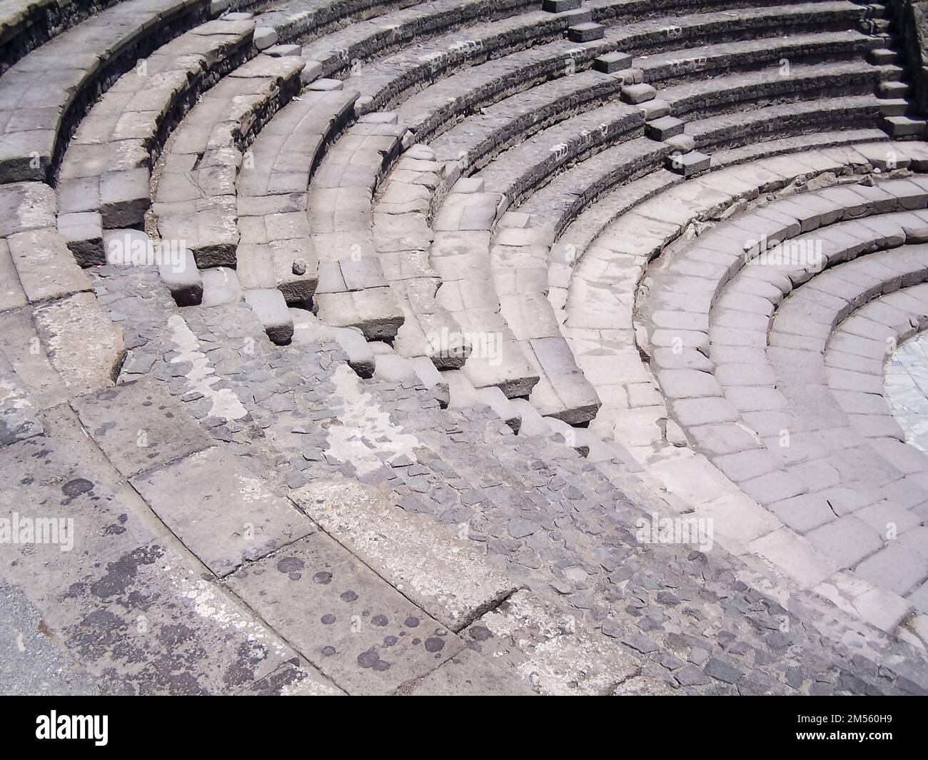 Tiered seating inside the amphitheatre at Pompeii, Italy Stock Photo ...