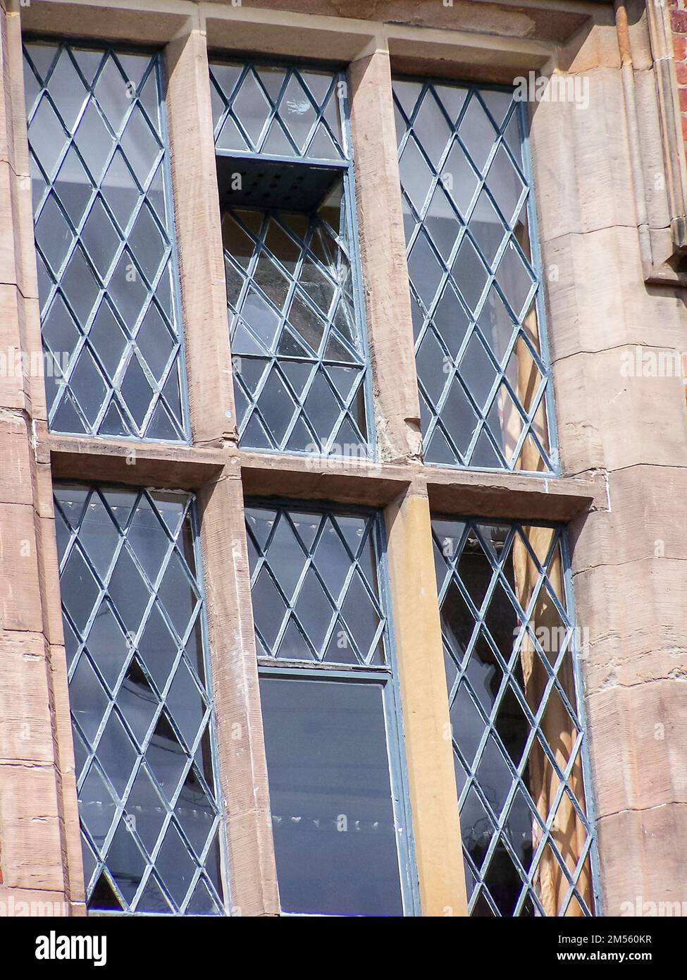Leaded glass windows in a stone frame in a 18th century building Stock ...