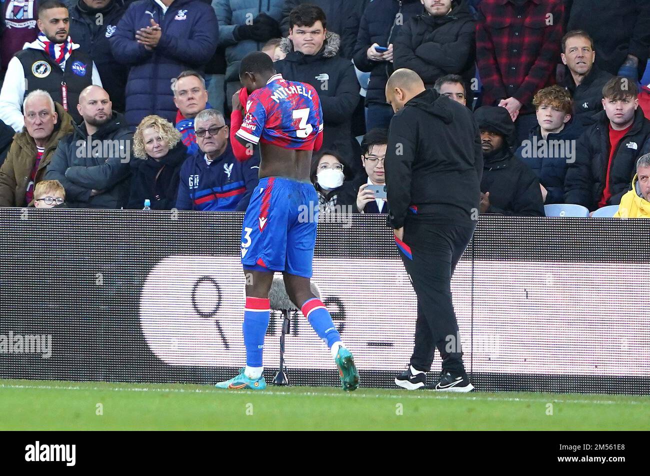 Crystal Palace's Tyrick Mitchell (left) looks dejected after being ...