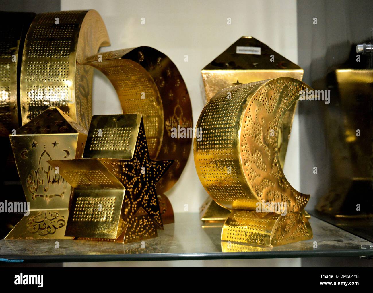 Golden metal Islamic Ramadan lanterns and crescent moon shape, Fanous ...