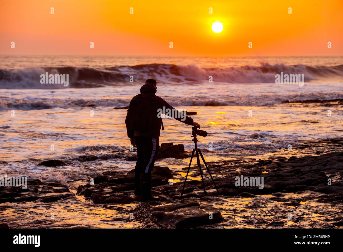 Silhouette,of,Photographer,photography,with,camera,on,tripod ...