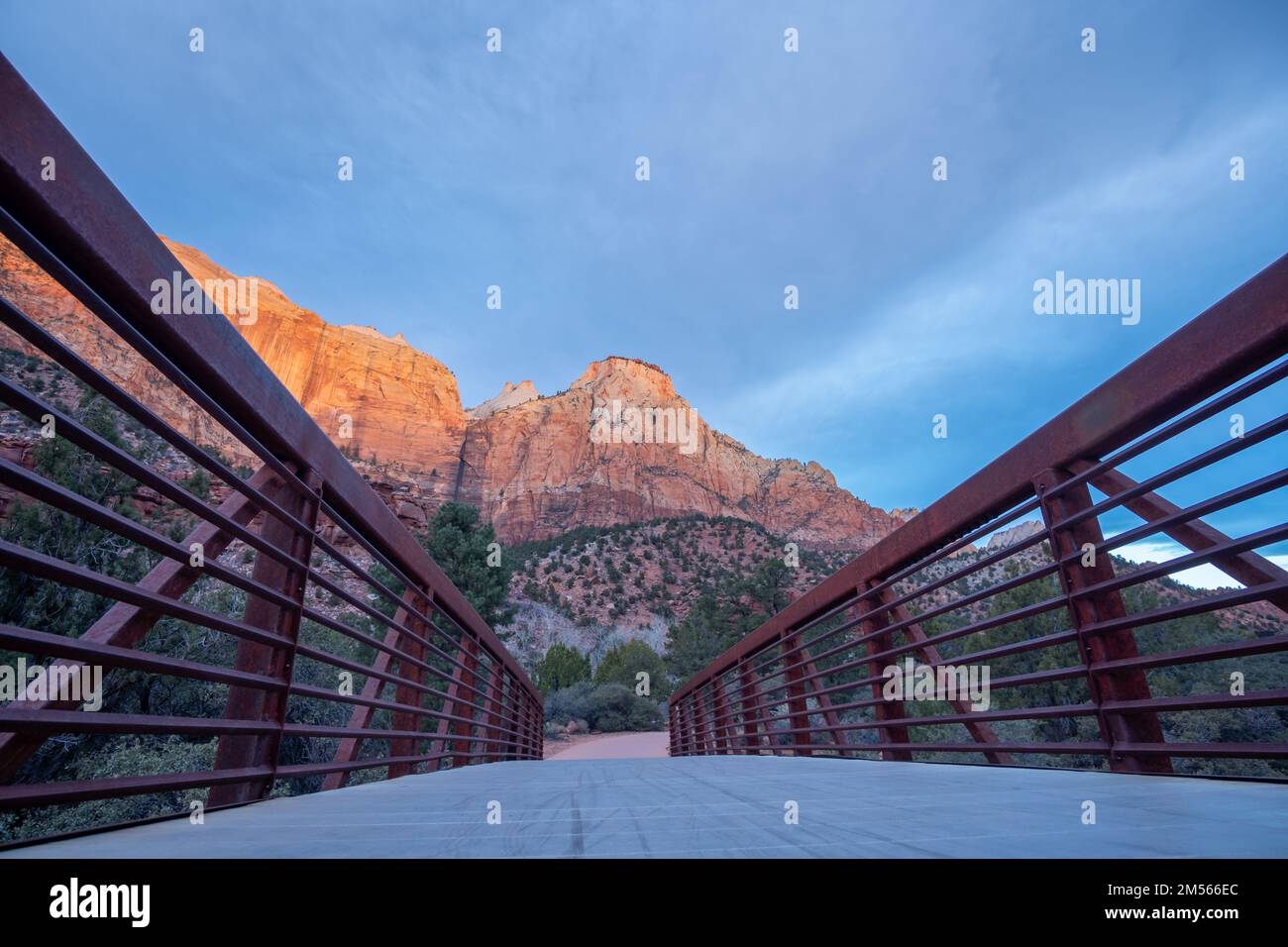 Low angle View of Bridge to Zion Large Rock Mountains on the other Side ...