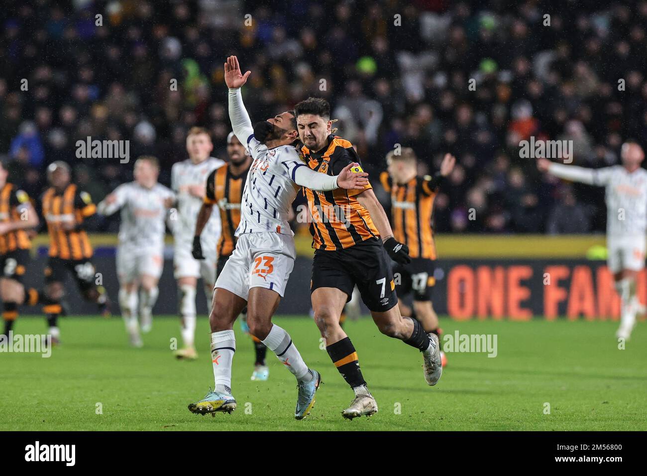 Ozan Tufan #7 of Hull City fouls Dominic Thompson #23 of Blackpool ...