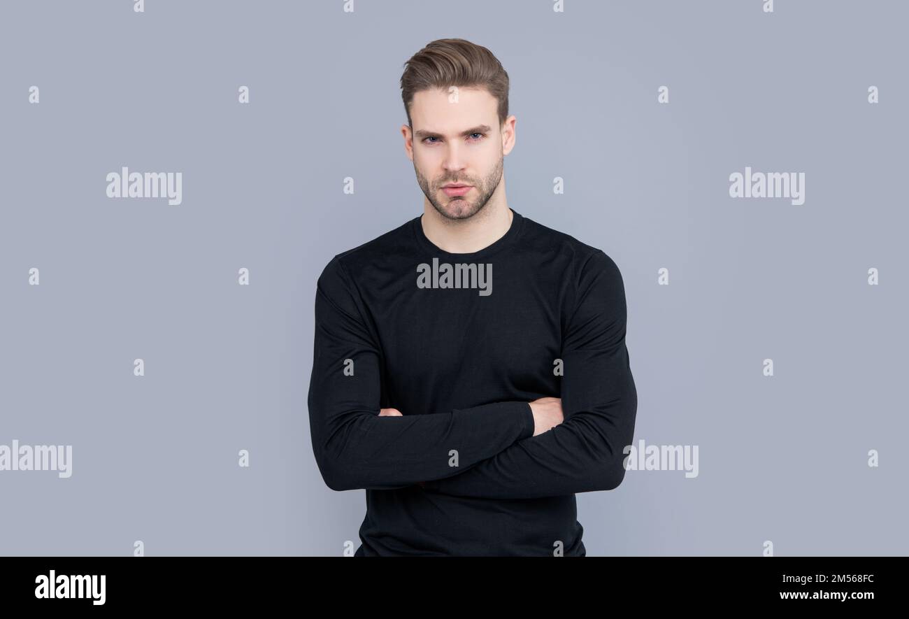 confident man with stubble isolated on grey background. face of ...