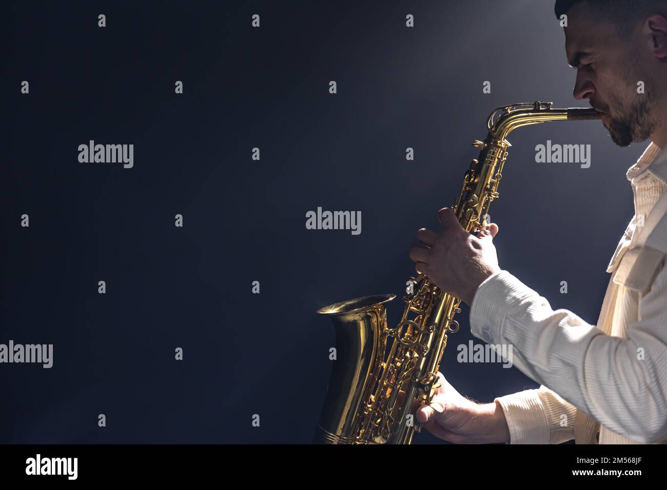 Sax player in the sun hi-res stock photography and images - Alamy