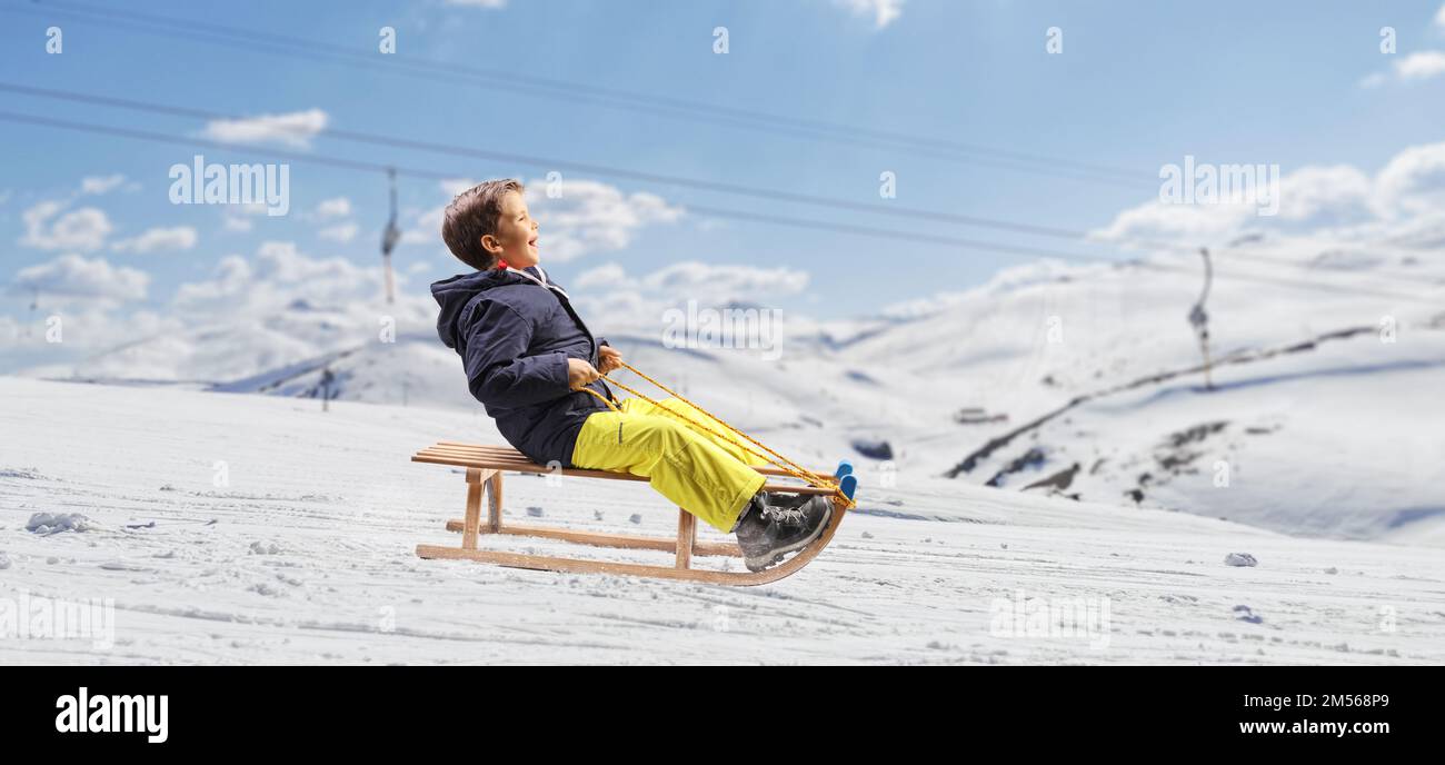 Boy sliding on a rope hi-res stock photography and images - Alamy