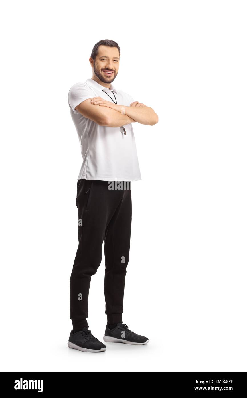 Full length portrait of a sports coach posing and smiling isolated on ...