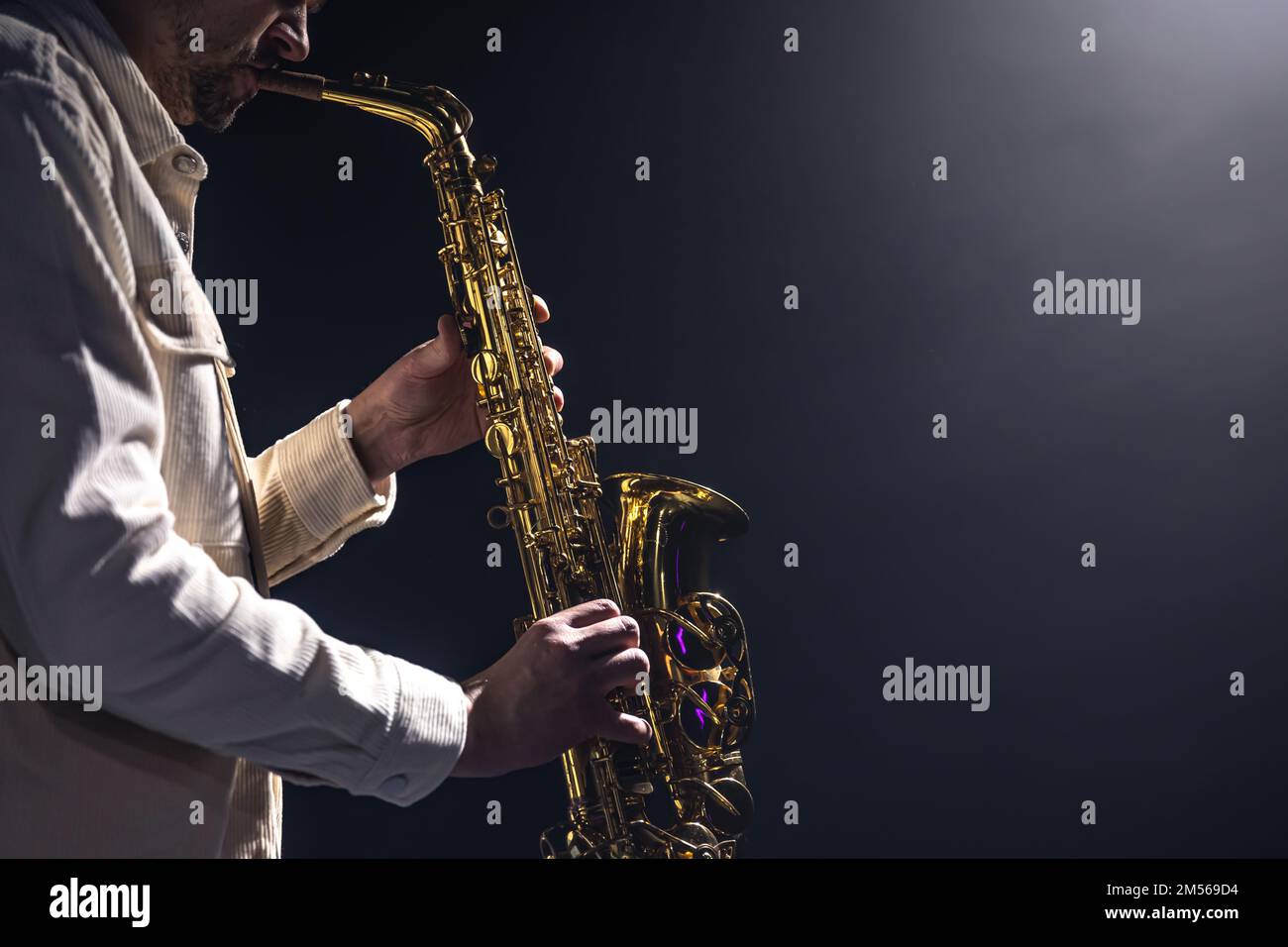 Sax player in the sun hi-res stock photography and images - Alamy
