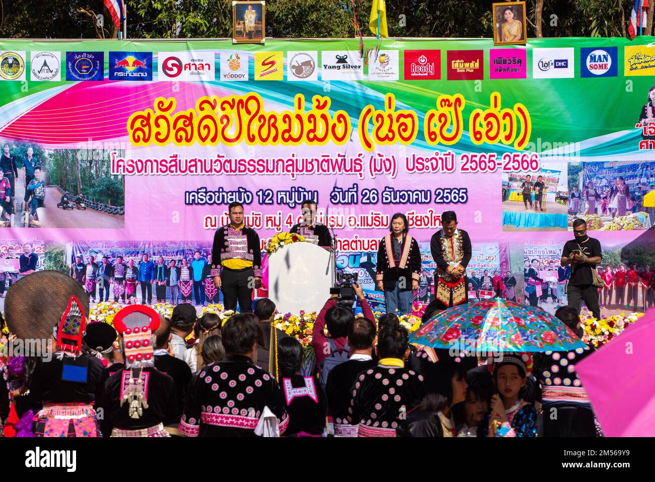 Hmong hill tribe men and women wear colorful interpretations of ...