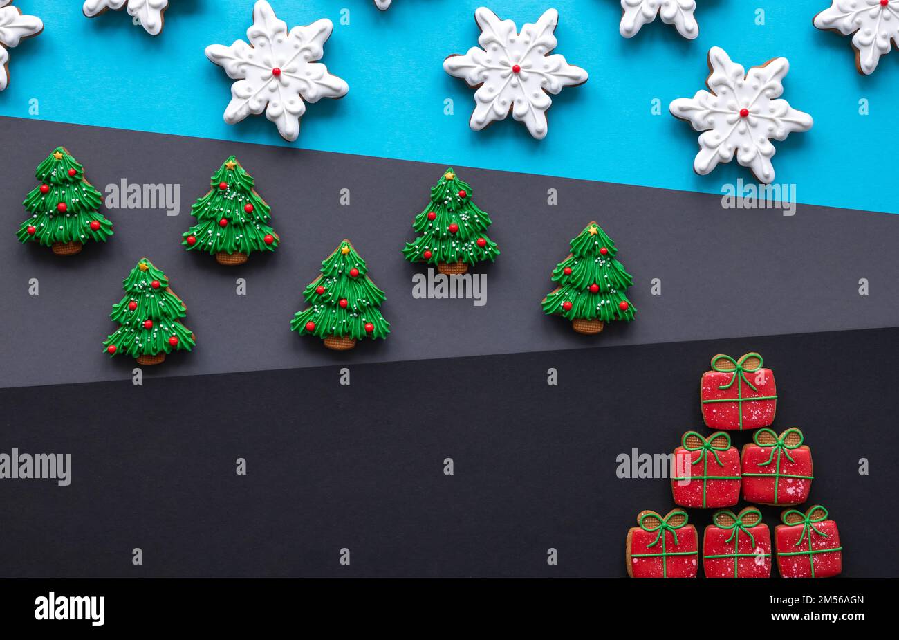 Christmas gingerbread covered with icing on a colored background, flat ...