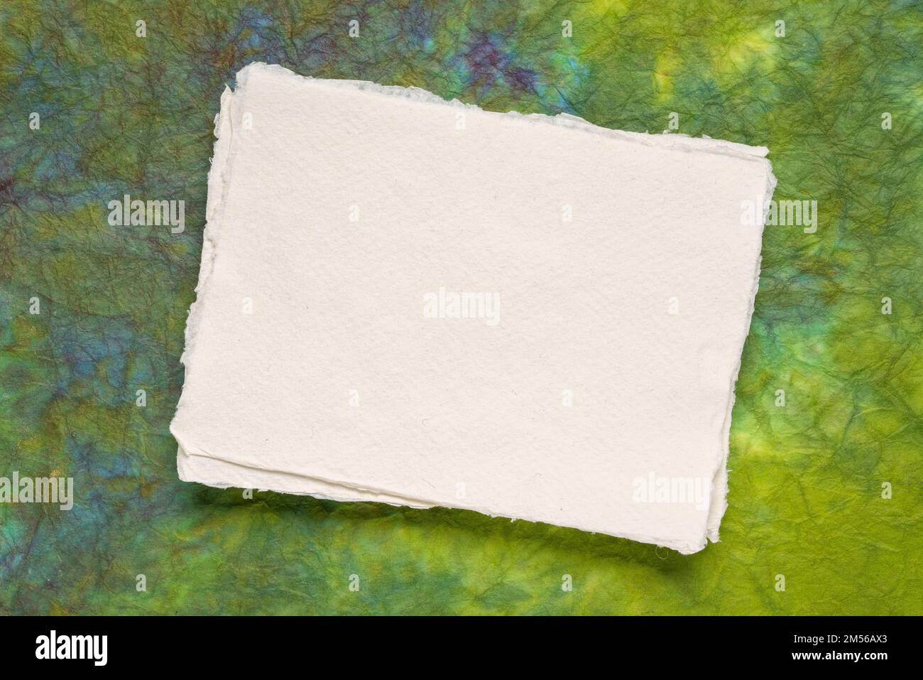 small sheet of blank white Khadi rag paper from South India against ...