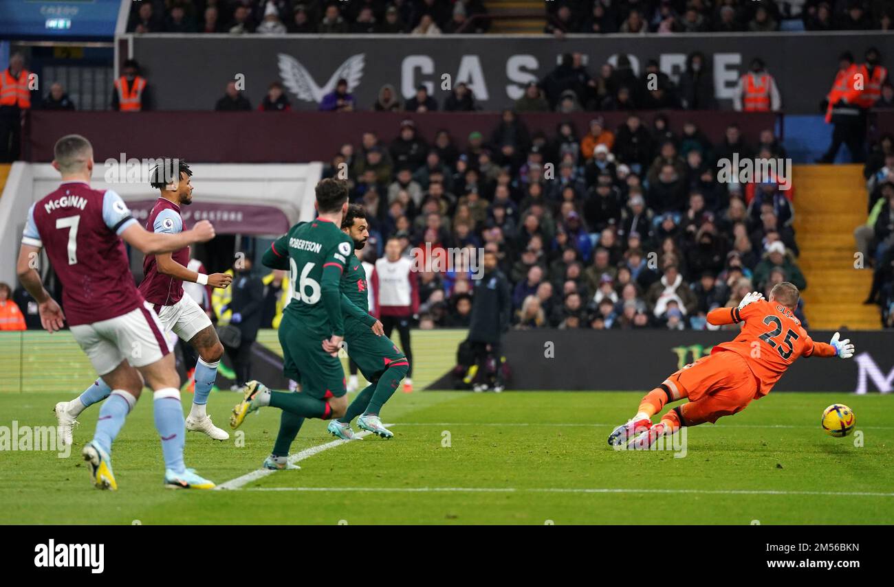 Liverpool's Mohamed Salah (second right) scores their side's first goal ...
