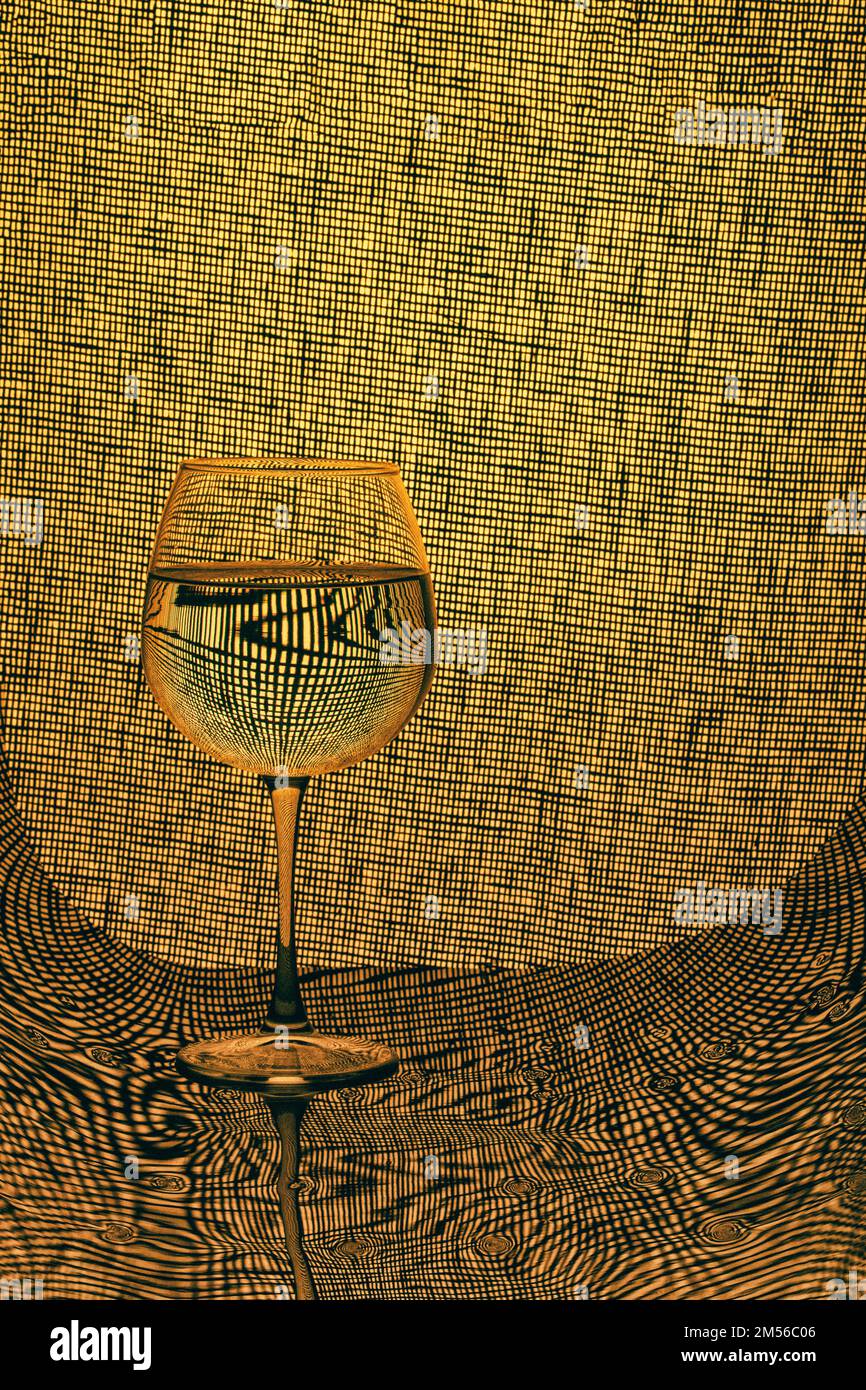 Still life with a glass on a mesh background Stock Photo - Alamy