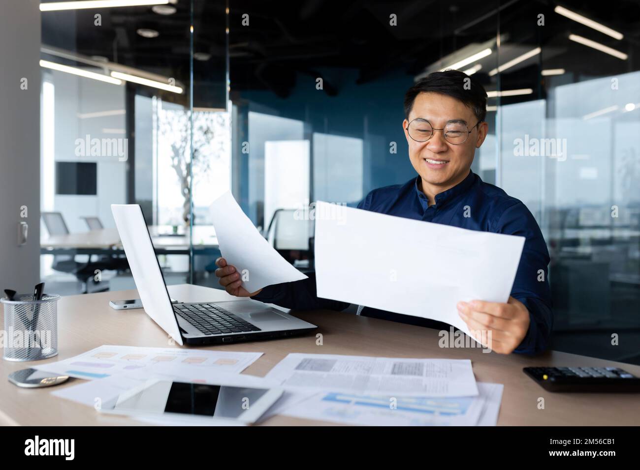 Male real estate engineer studying hi-res stock photography and images ...