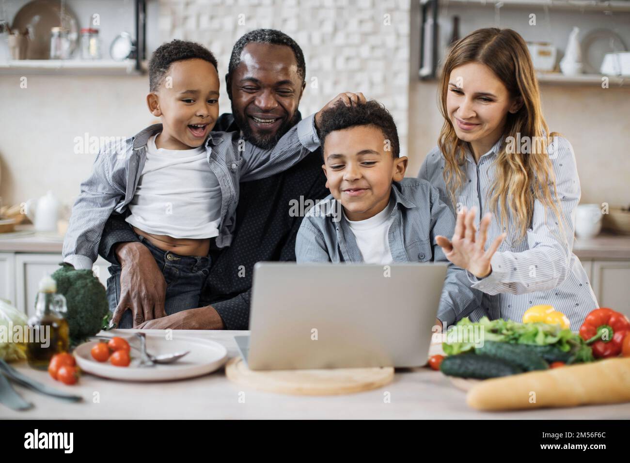 Multinational family of african cute little sons, father and caucasian ...