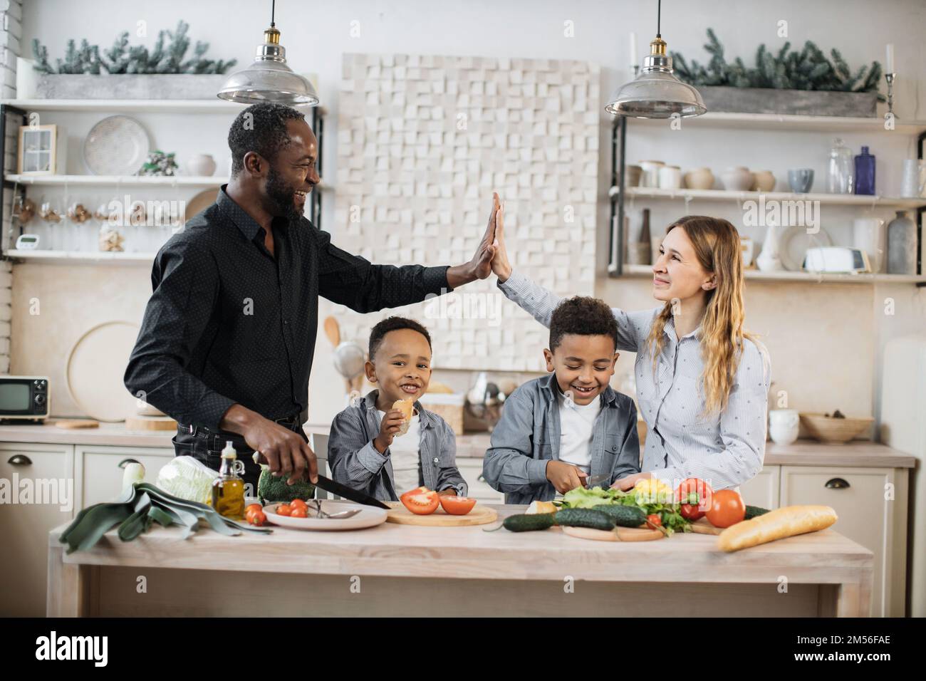 Help father cook hi-res stock photography and images - Alamy