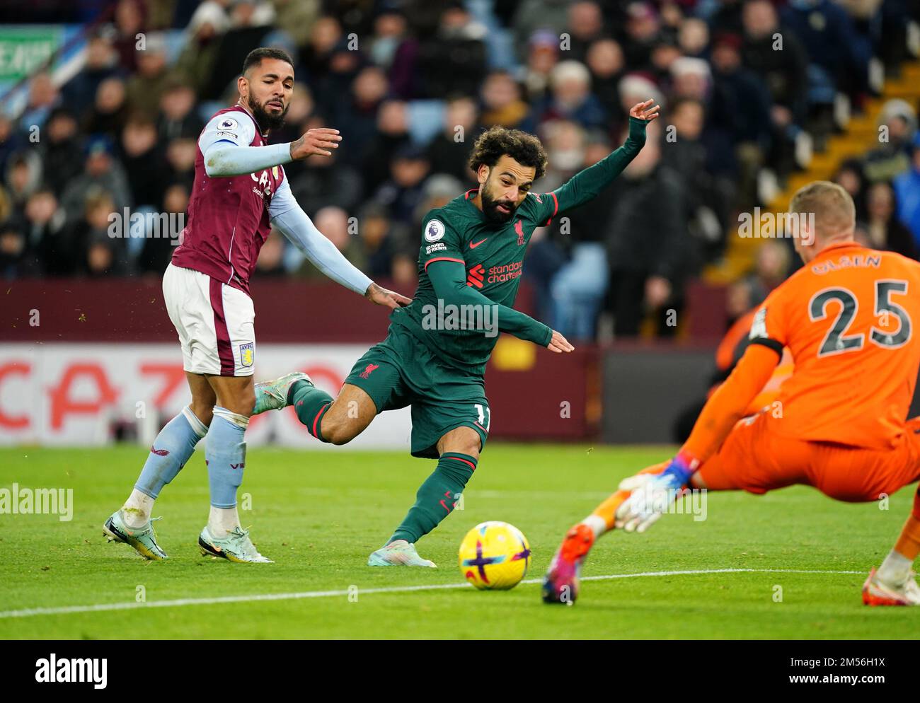 Liverpool's Mohamed Salah almost scores with a shot that hits the post ...