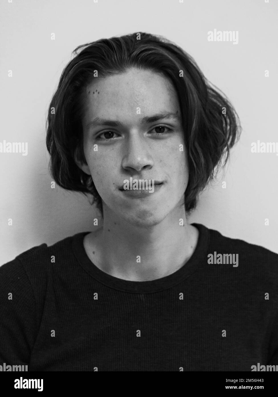 A grayscale portrait of a Latin guy from Colombia Stock Photo - Alamy