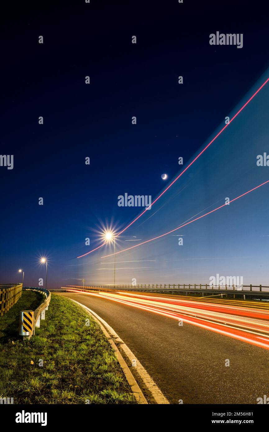 Traffic light trails through the flyover over the new HS2 rail line in ...
