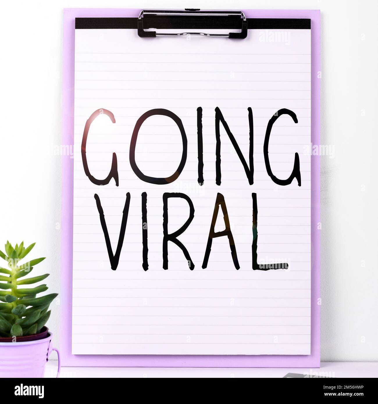 Hand writing sign Going Viral, Business concept image video or link ...