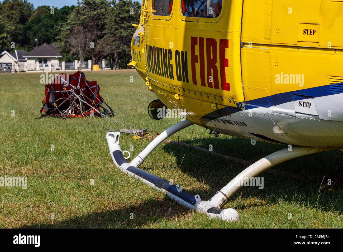 A side view of a huey firefighting helicopter Stock Photo - Alamy