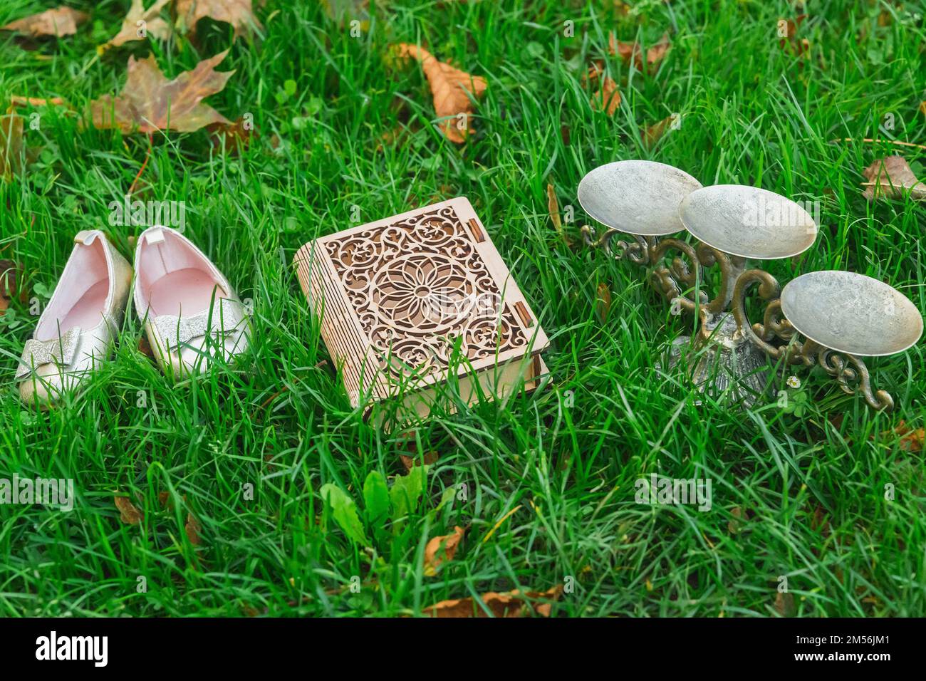 Little princess things: shoes, casket and antique candlestick Stock ...