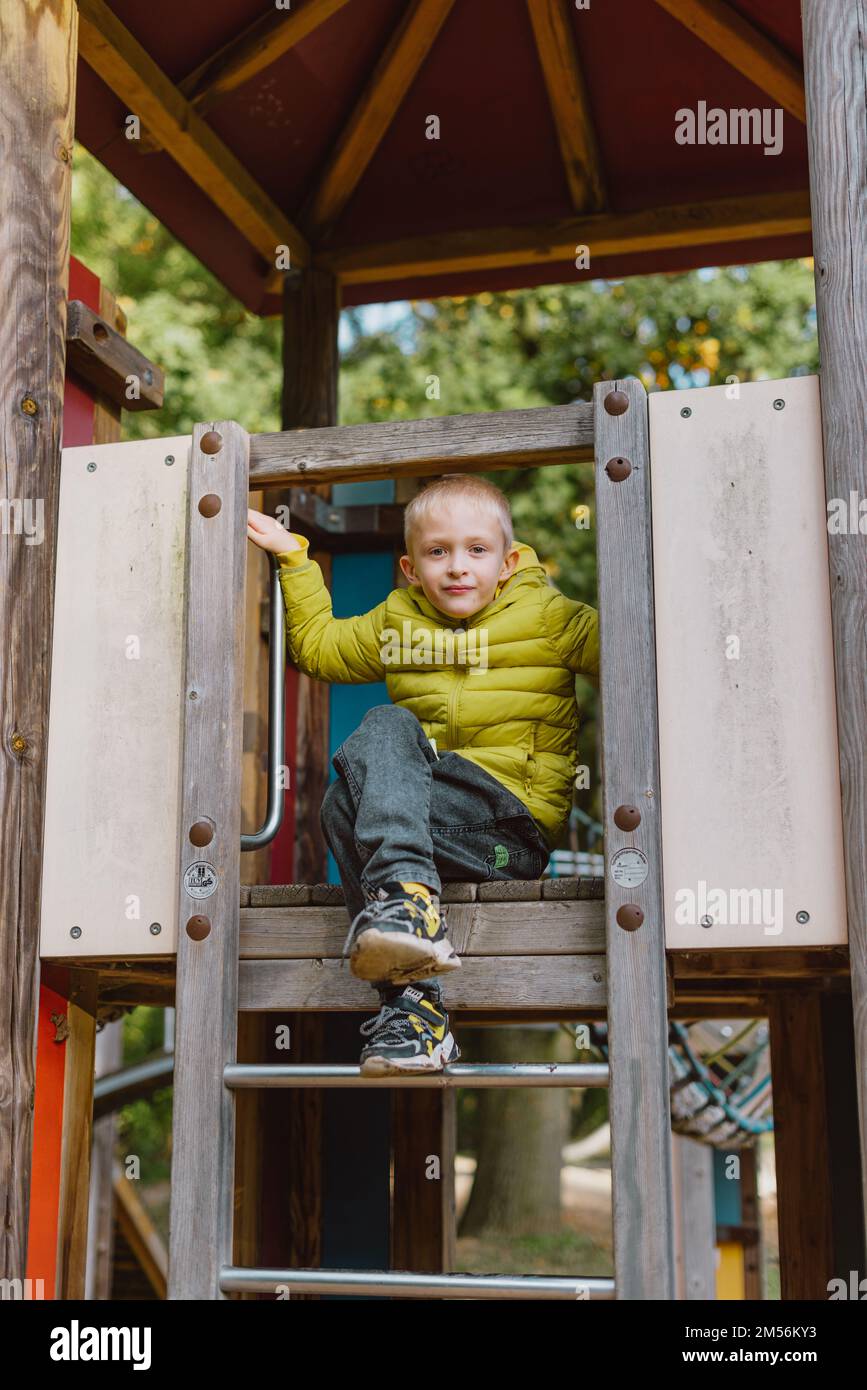Boy At The Climbing Wall Without A Helmet, Danger At The Climbing Wall ...