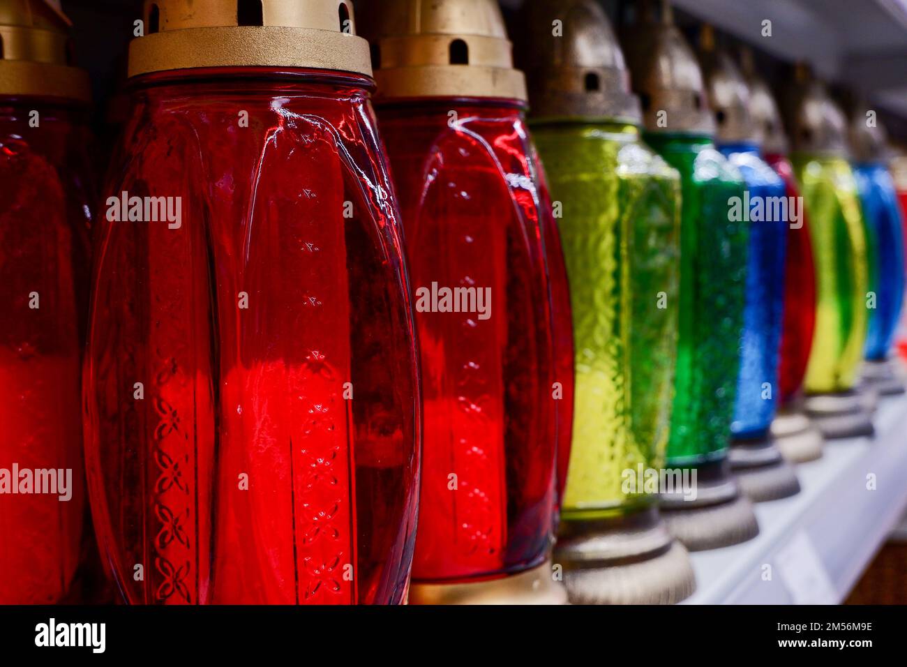 Multi-colored lamps are on sale at the supermarket counter Stock Photo ...