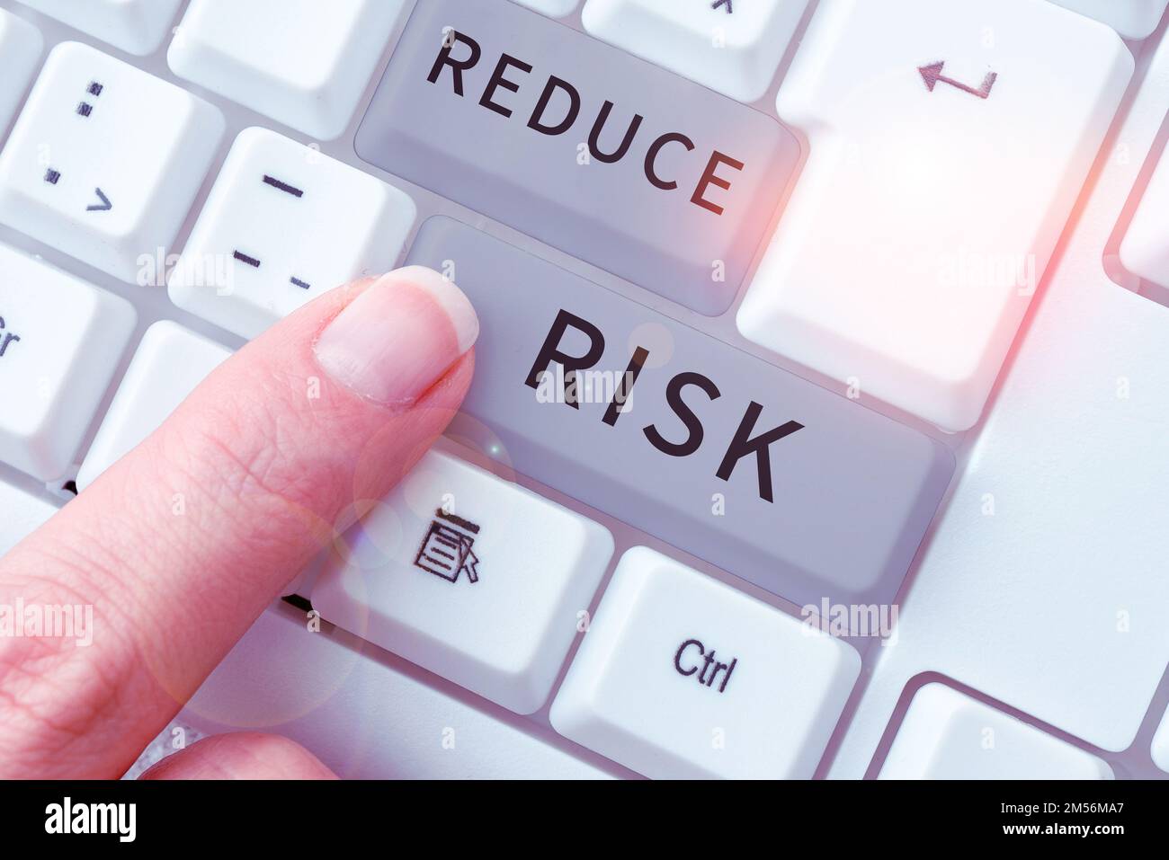 Hand writing sign Reduce Risk. Word for lessen the potential damage ...